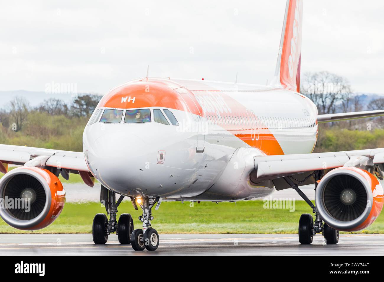 Close up of an EasyJet Airbus A320 as it taxis off the runway at ...