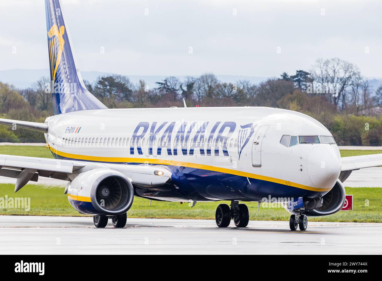 Close up of a Ryanair Boeing 737-8AS taxiinf off the runway at ...