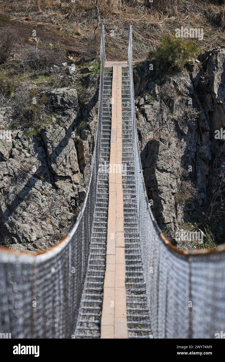 Suspension excursion bridge over gorge. Sightseeing holiday tour ...