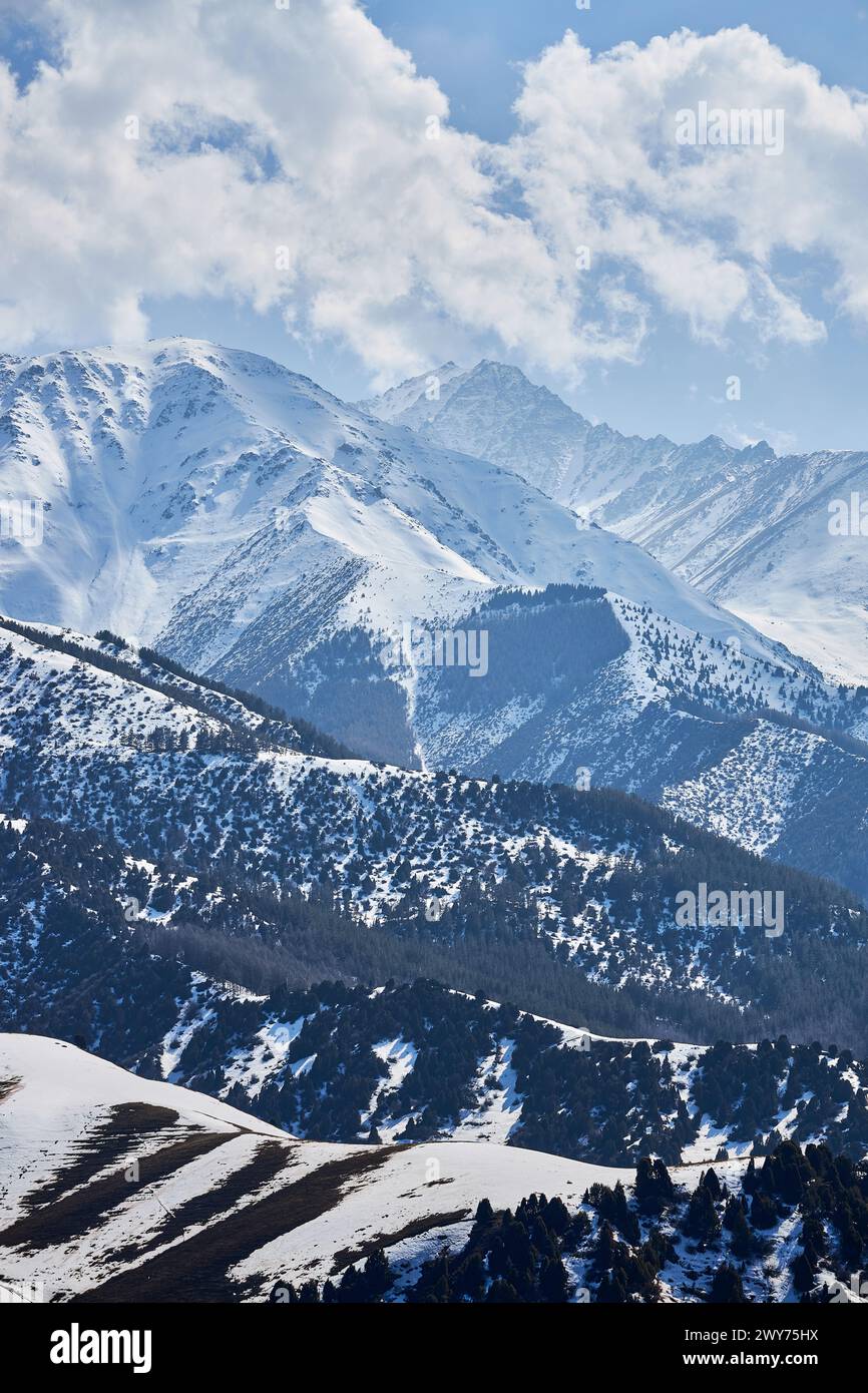 Panoramic view snow capped high mountains. Winter natural landscape ...