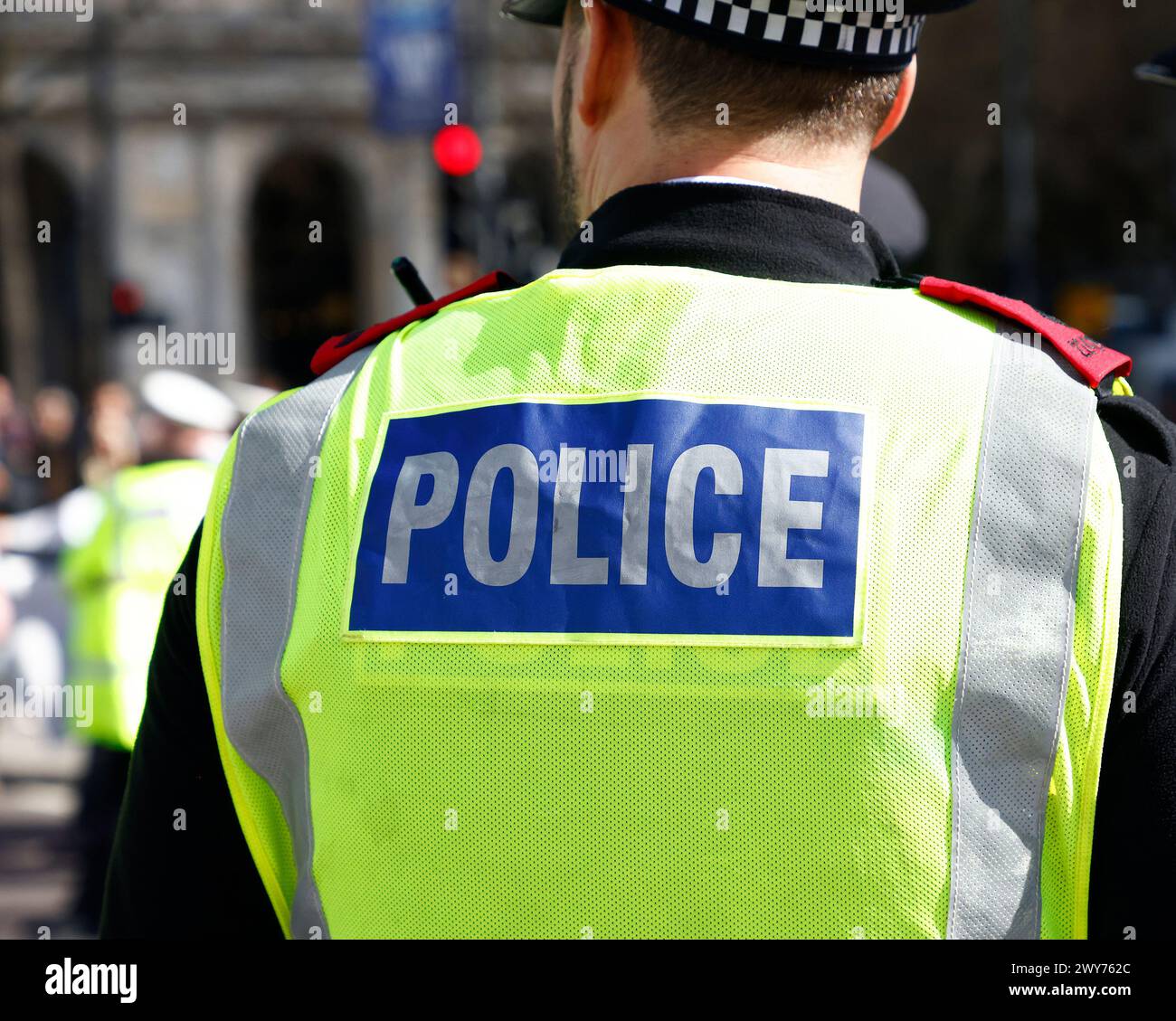Uk police man rear view hi-res stock photography and images - Alamy