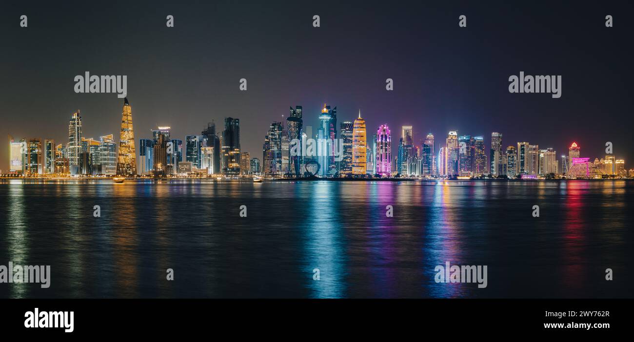 Doha night city skyline illuminated at night. Qatar, Middle East ...