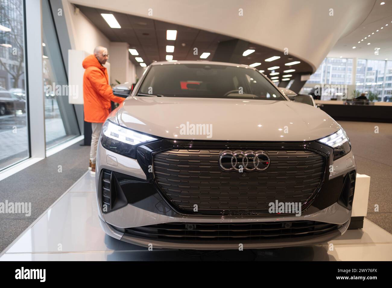 client choosing grey All-electric crossover Audi Q4 e-tron with ...