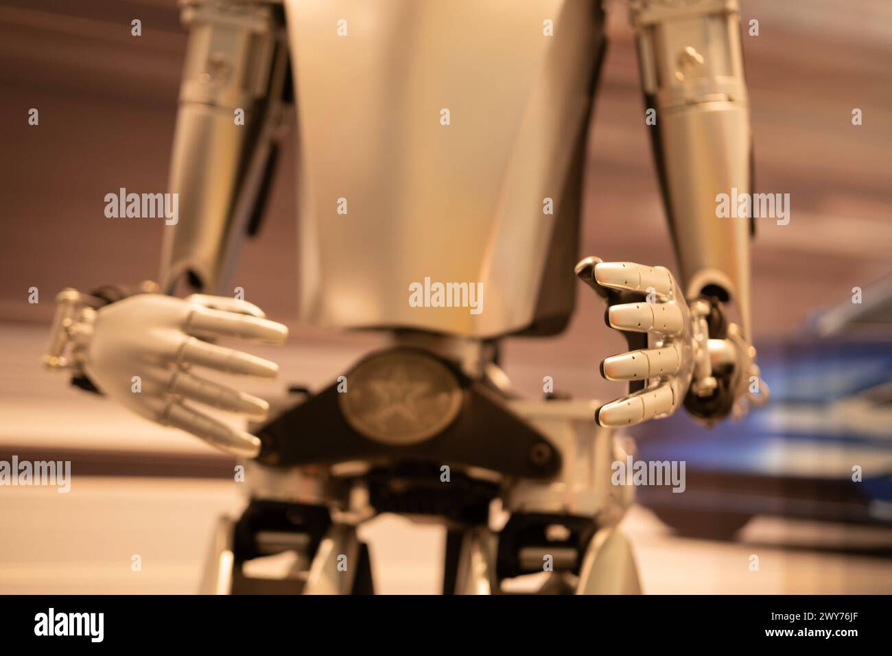 Tesla Bot Optimus robotic humanoid in showroom, Tesla AI Strategy: Elon ...