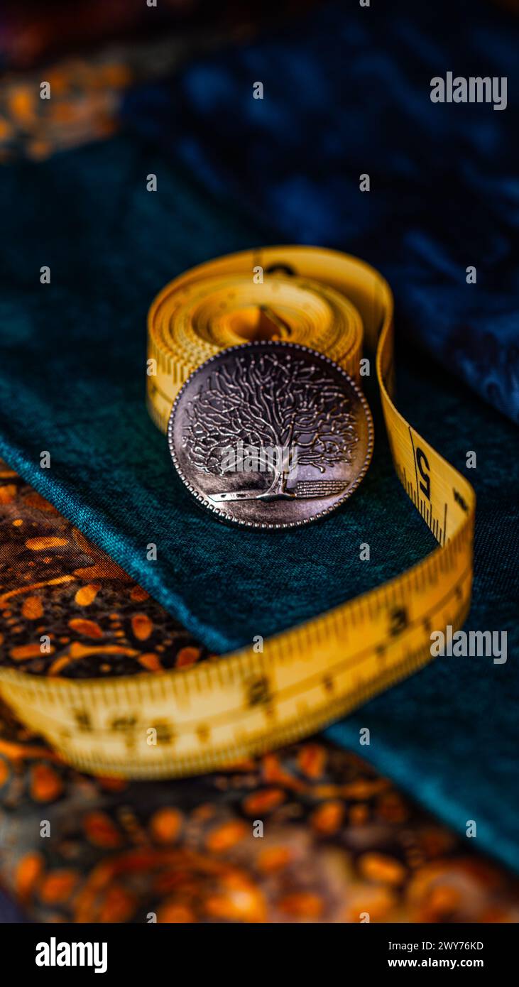 Button and Tape Measure Stock Photo - Alamy