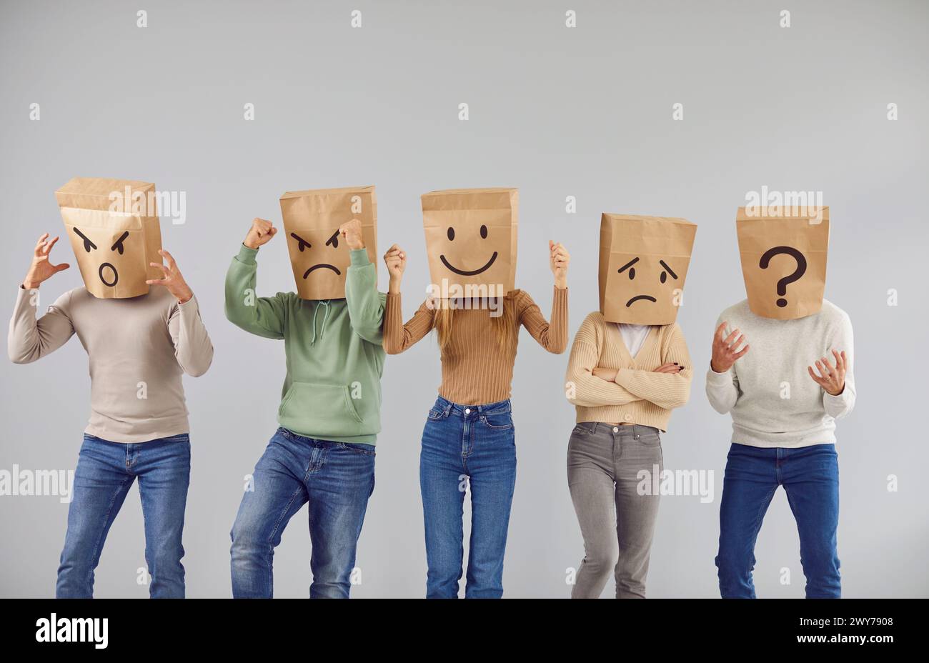 Group of people expressing different emotions wearing brown paper bags ...