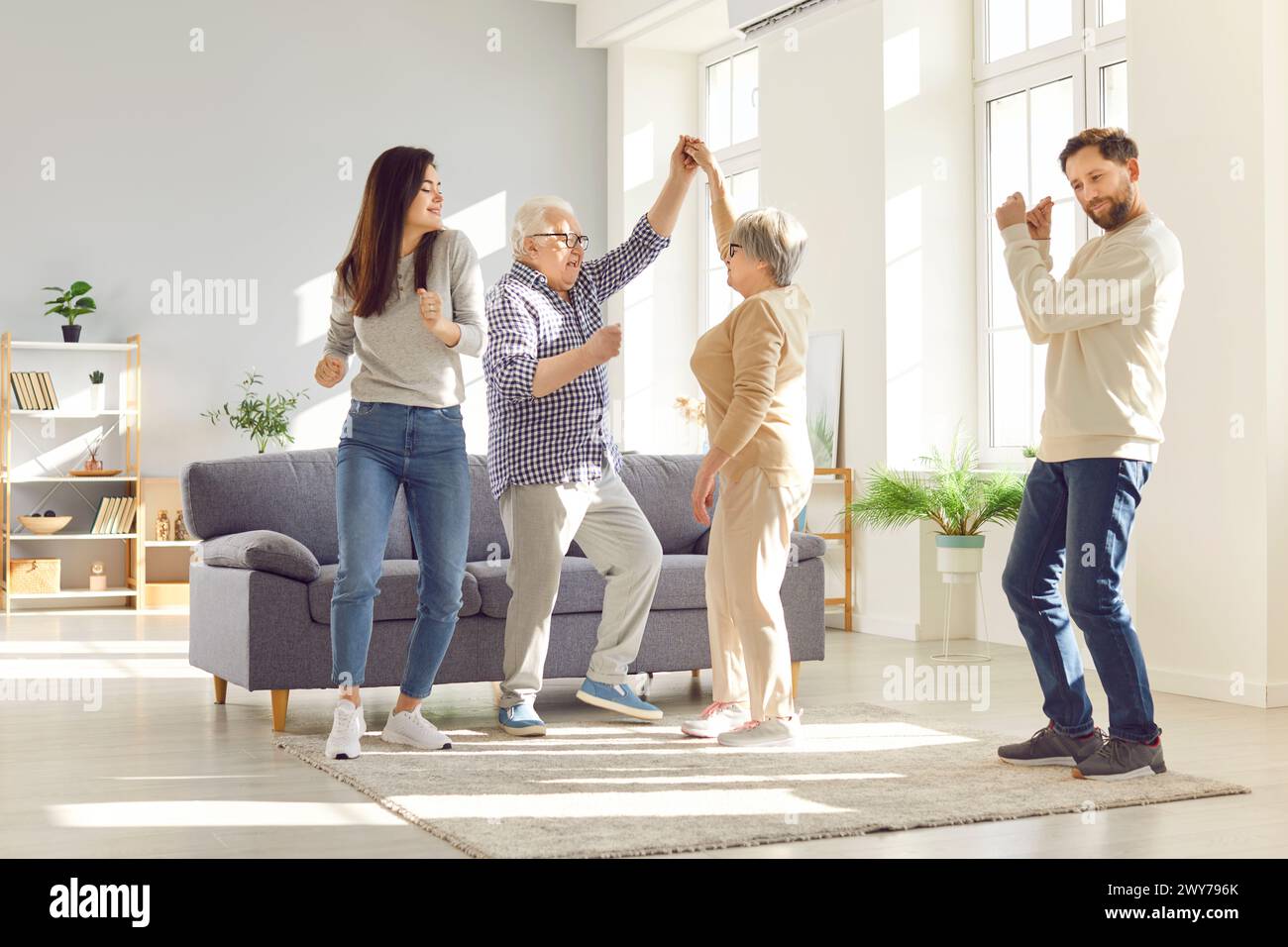 Two children dancing joyfully hi-res stock photography and images - Alamy