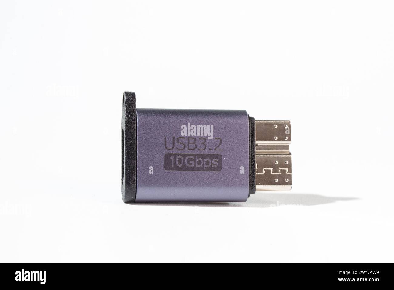 The image shows a dark grey USB 3.2 flash drive with a Type-C connector ...