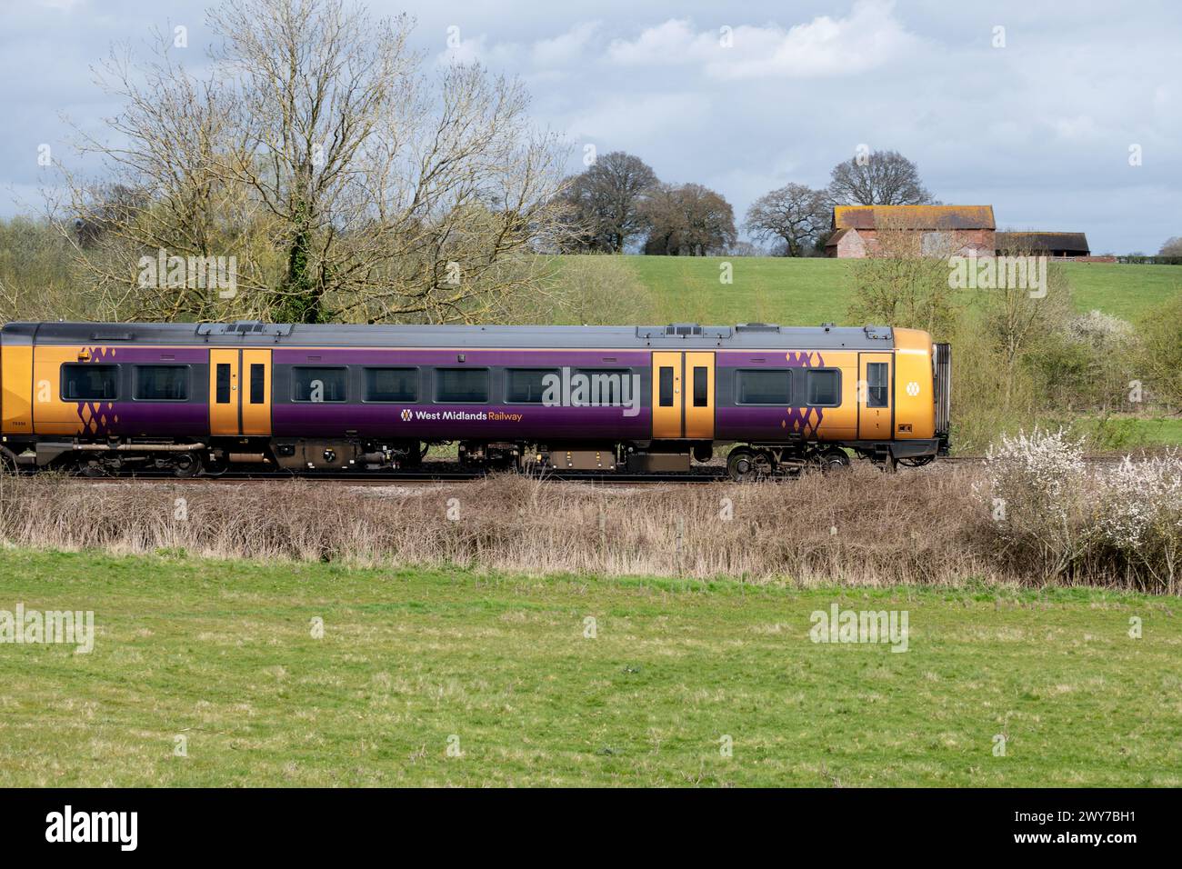 West Midlands Railway diesel train at Hatton North Junction ...