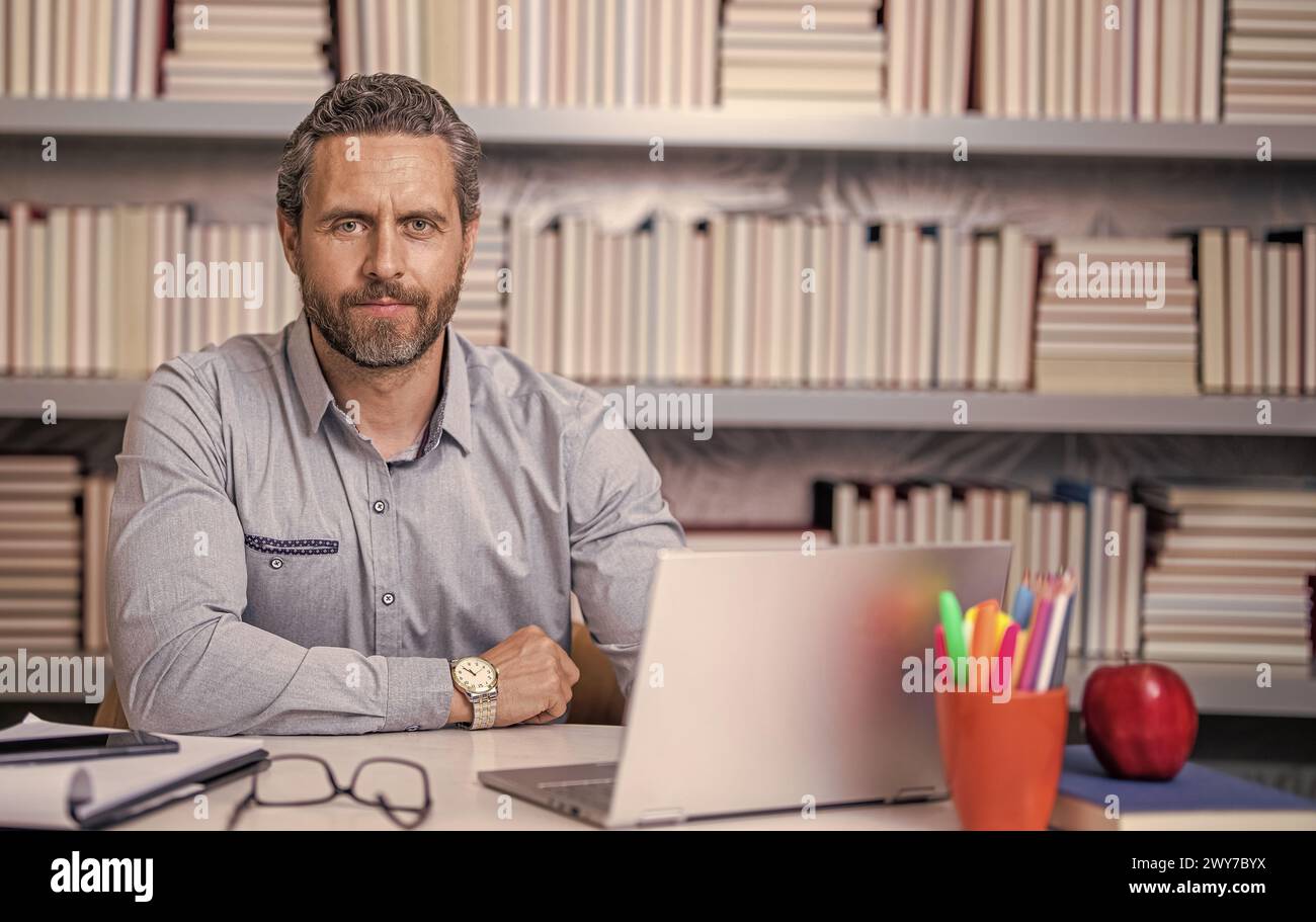 elearning education online with school teacher on laptop in classroom ...