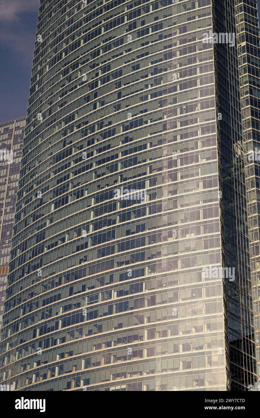 skyscraper with glassy facade. modern glass building. skyscraper in ...