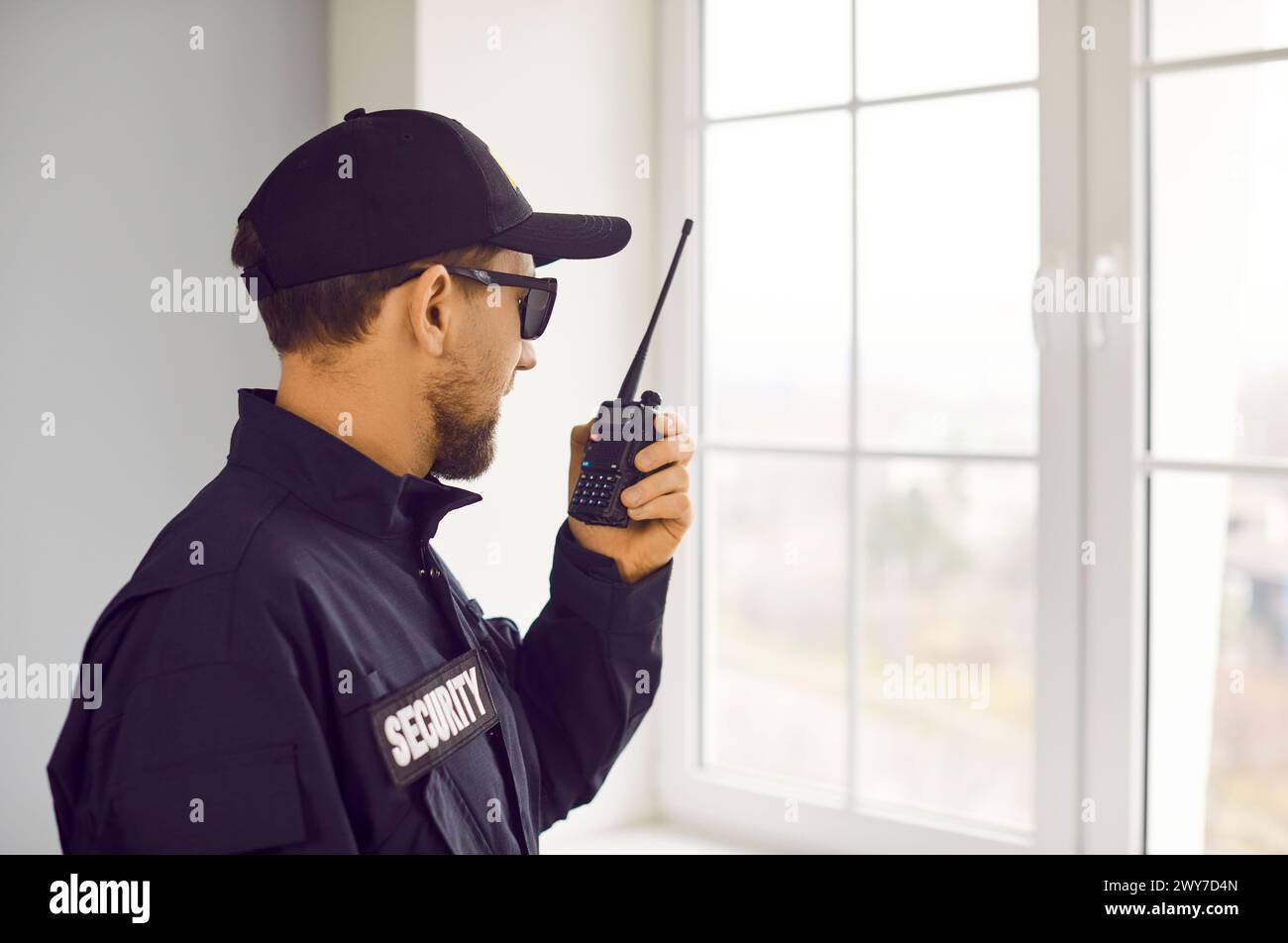 Black police officer talking on hi-res stock photography and images - Alamy