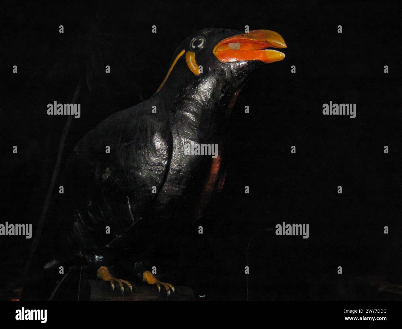 Big tioman bird sculpture during night time Stock Photo - Alamy