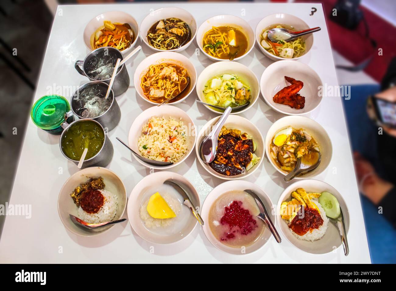 Plate with multiple edible food, traditional Malaysian food, among the ...