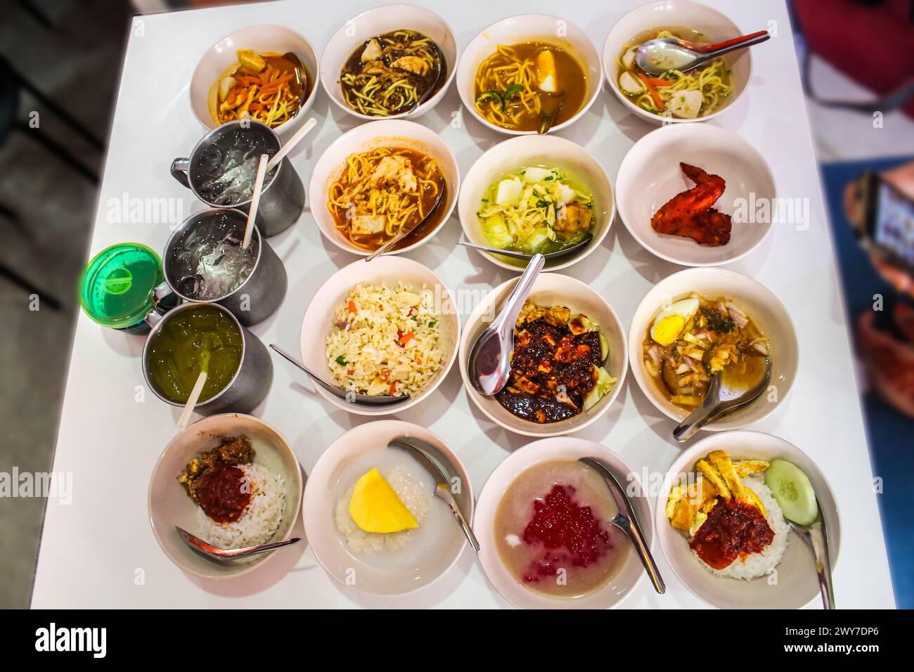 Plate with multiple edible food, traditional Malaysian food, among the ...