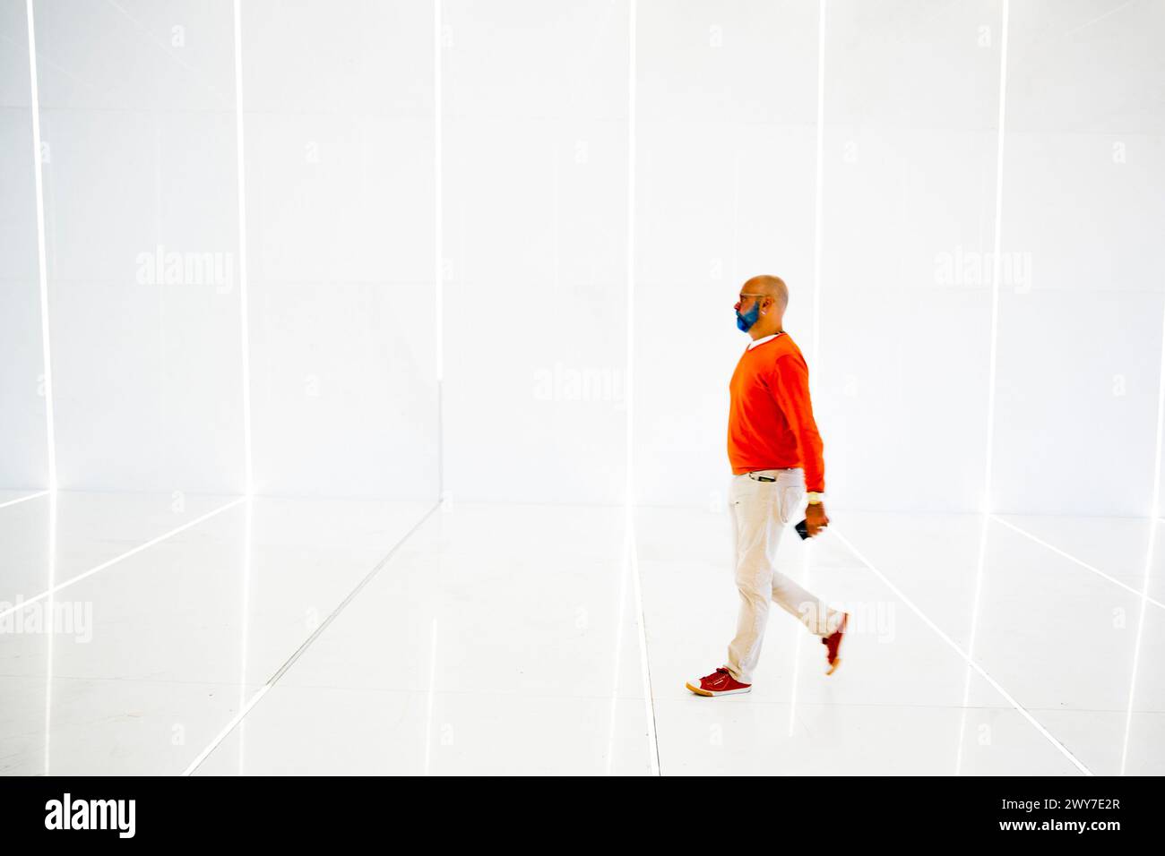 Man walking blue beard Stock Photo - Alamy