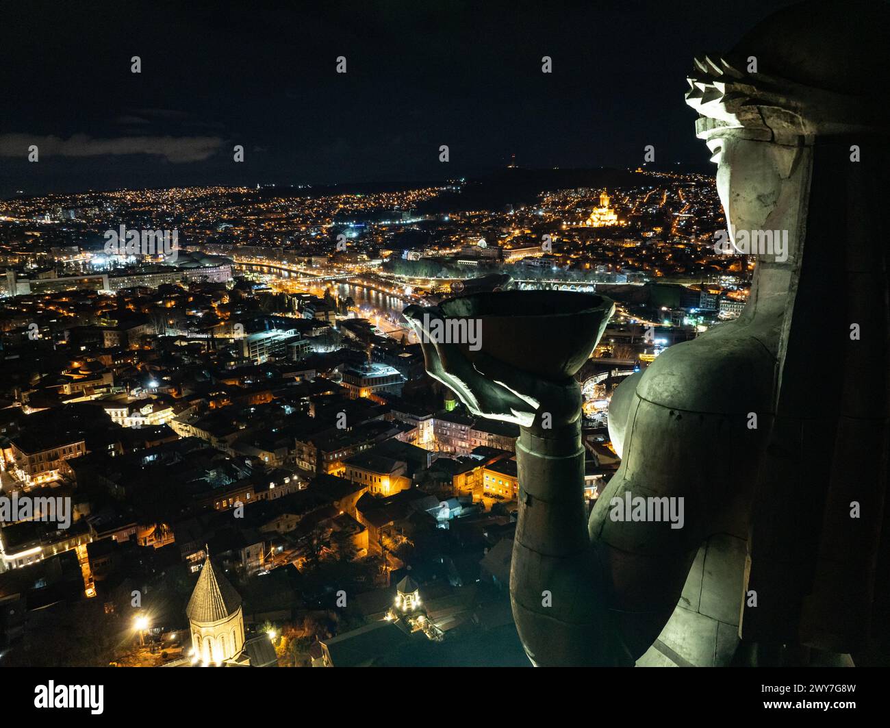 Aerial drone night photo of Tbilisi. Mother of Georgia in Sololaki hill ...