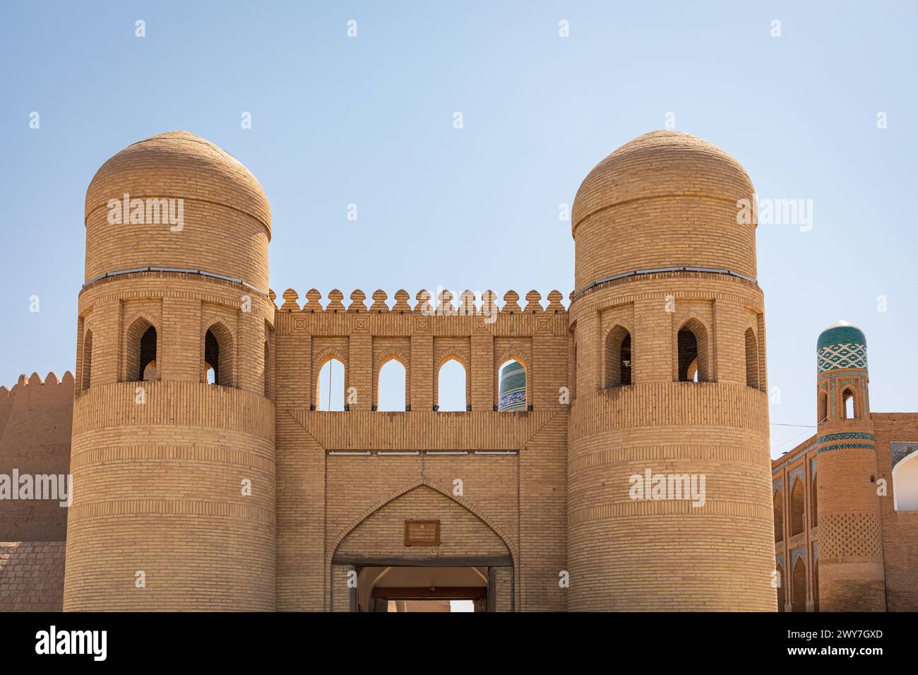 Khiva, Xorazm Region, Uzbekistan, Central Asia. Towers over a gate in ...