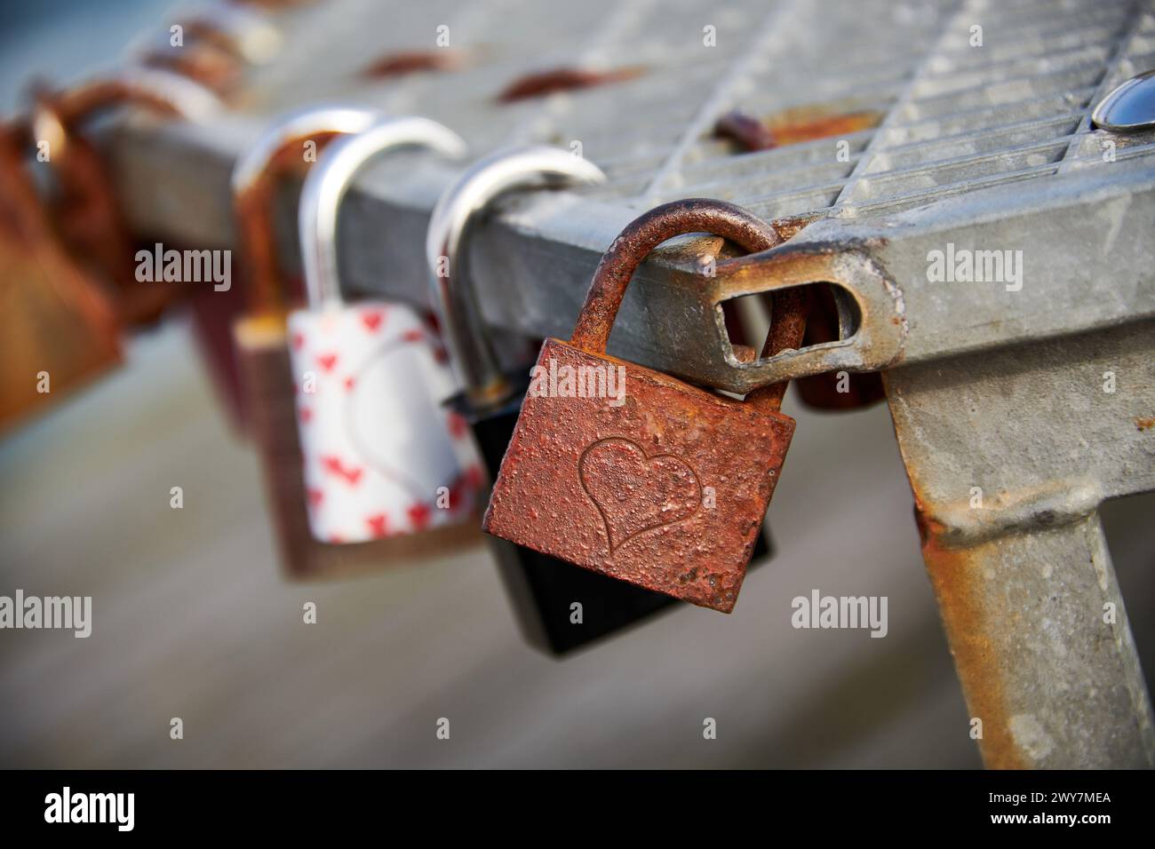 rusted lock with heart symbol Stock Photo - Alamy