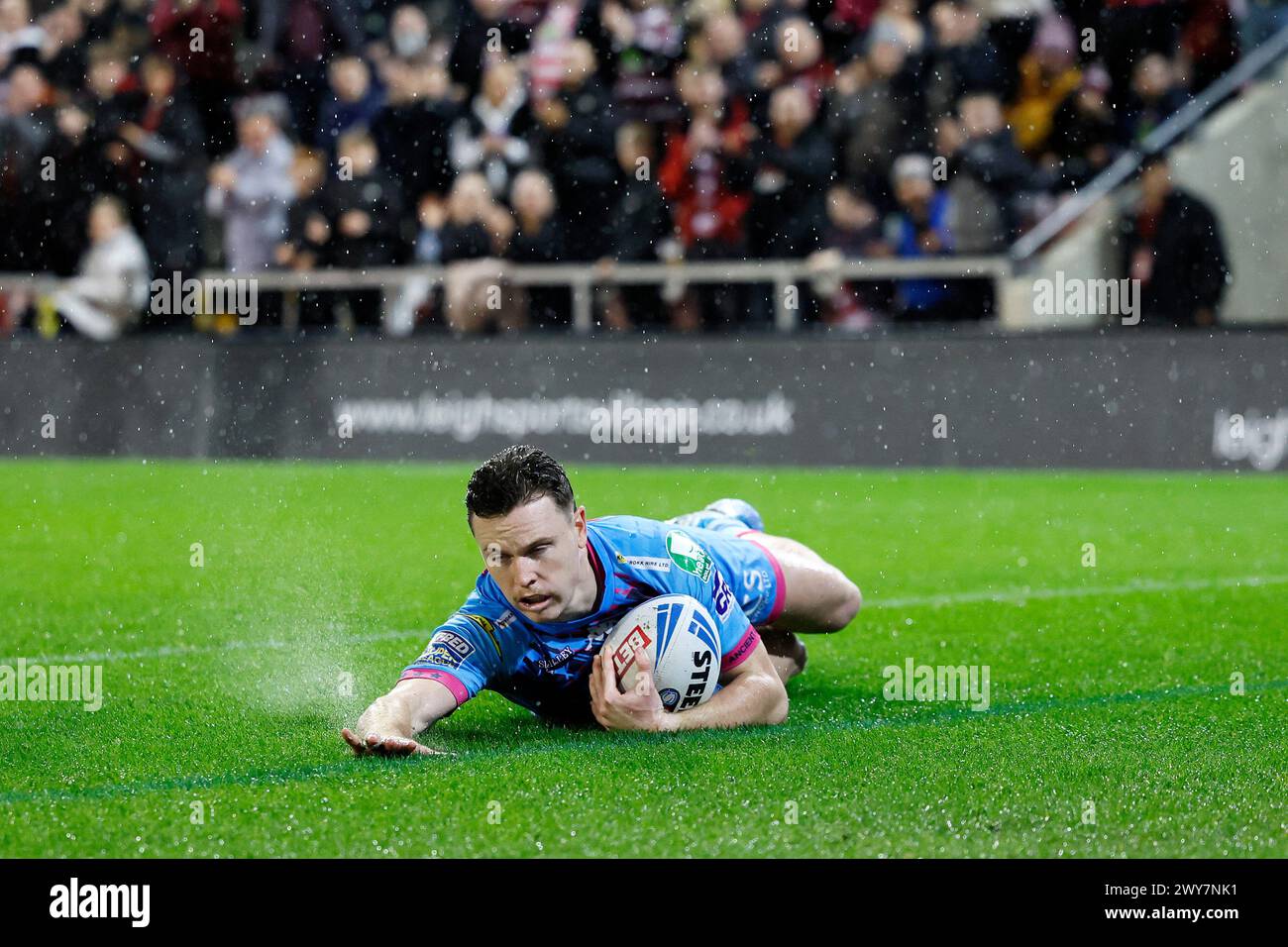 Wigan Warriors' Jai Field scores their side's fifth try of the game ...