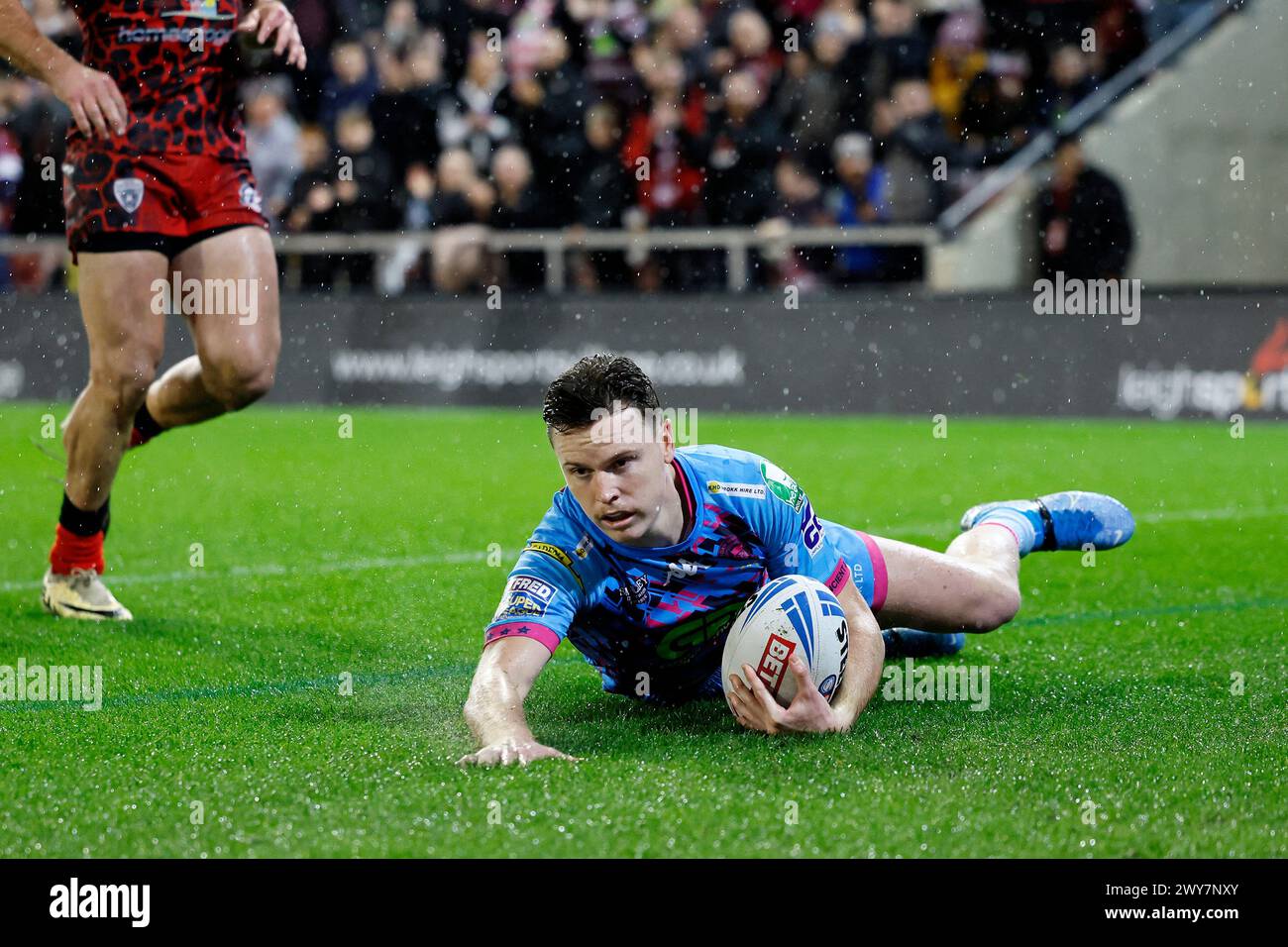 Wigan Warriors' Jai Field scores their side's fifth try of the game ...