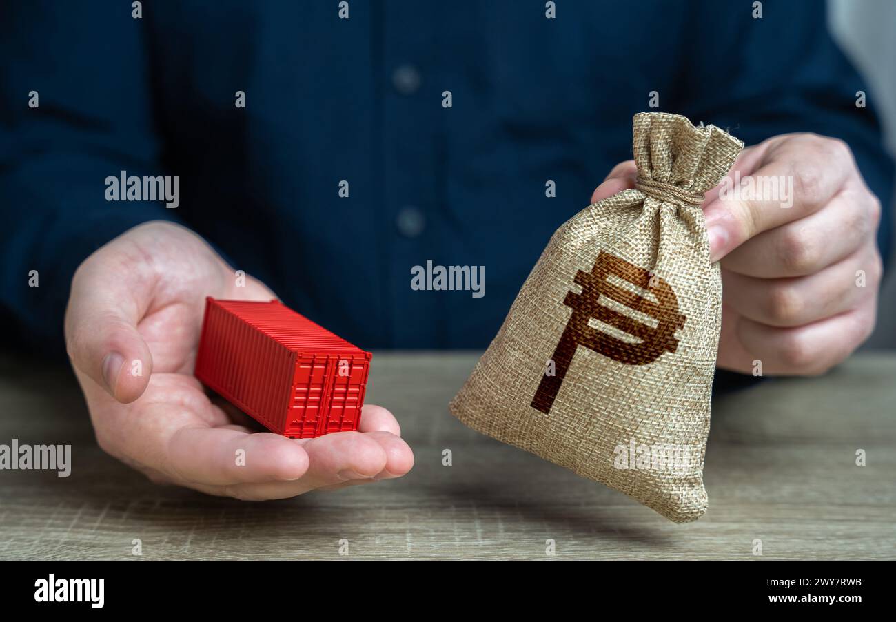 Ship container and philippine peso money bag. Transportation and ...