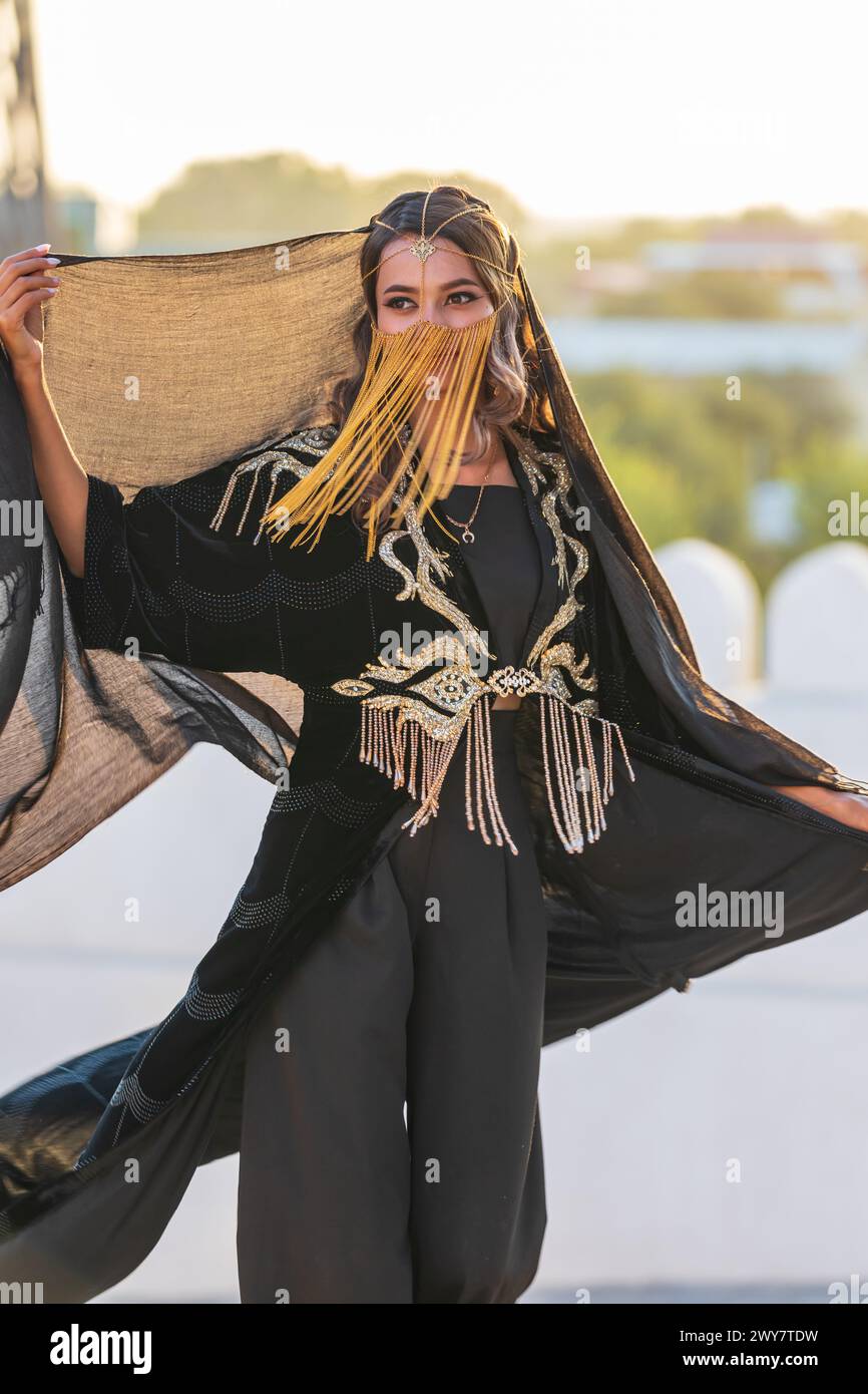 Bukhara, Uzbekistan, Central Asia. August 25, 2021. young Uzbek woman ...