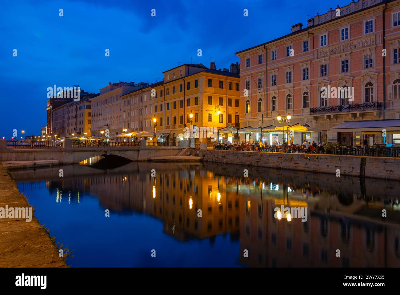 Night view of Boats mooring at Canal Grande in Italian city Trieste ...