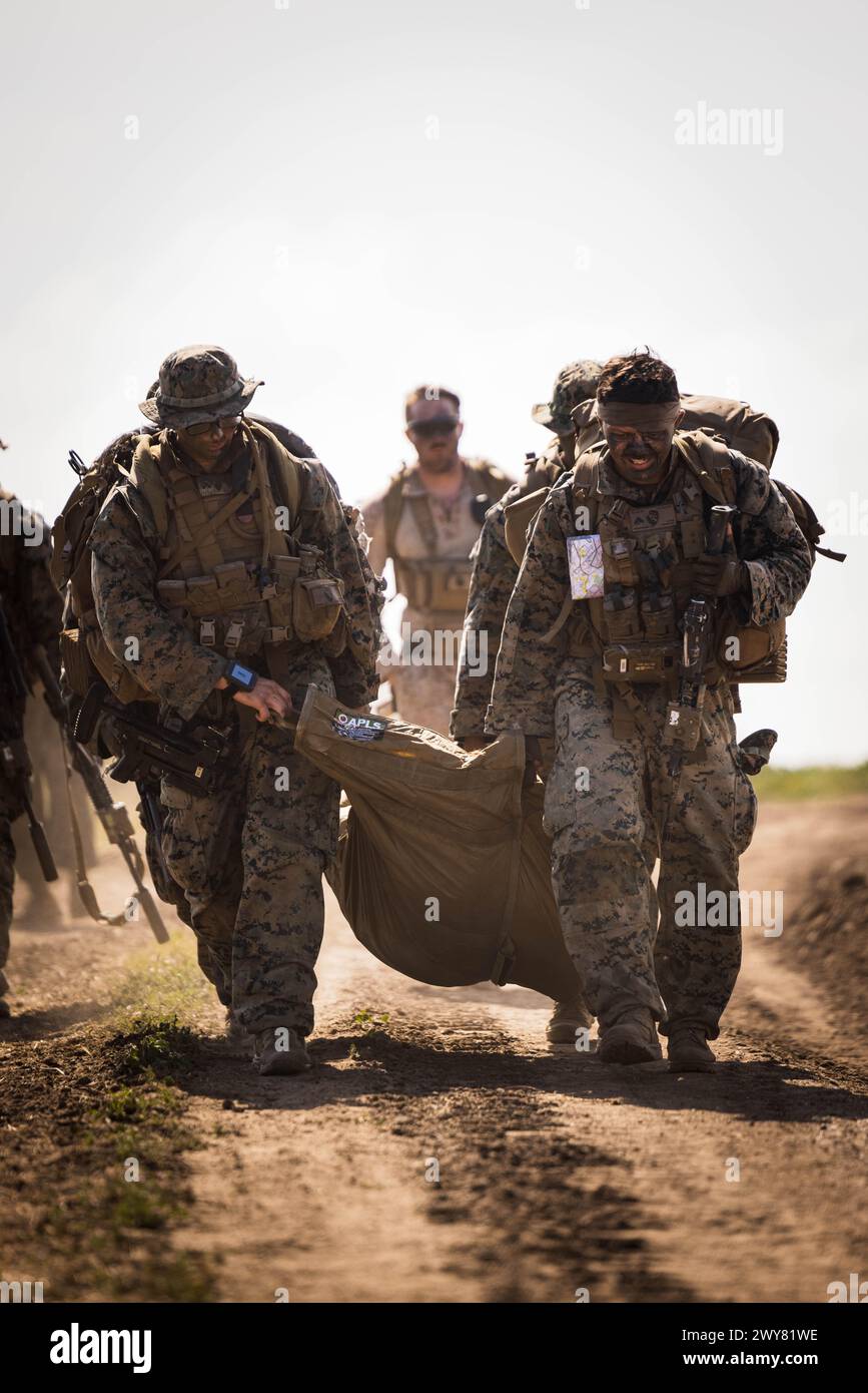 U.S. Marines with Bravo Company, 3rd Light Armored Reconnaissance Battalion, 1st Marine Division ...