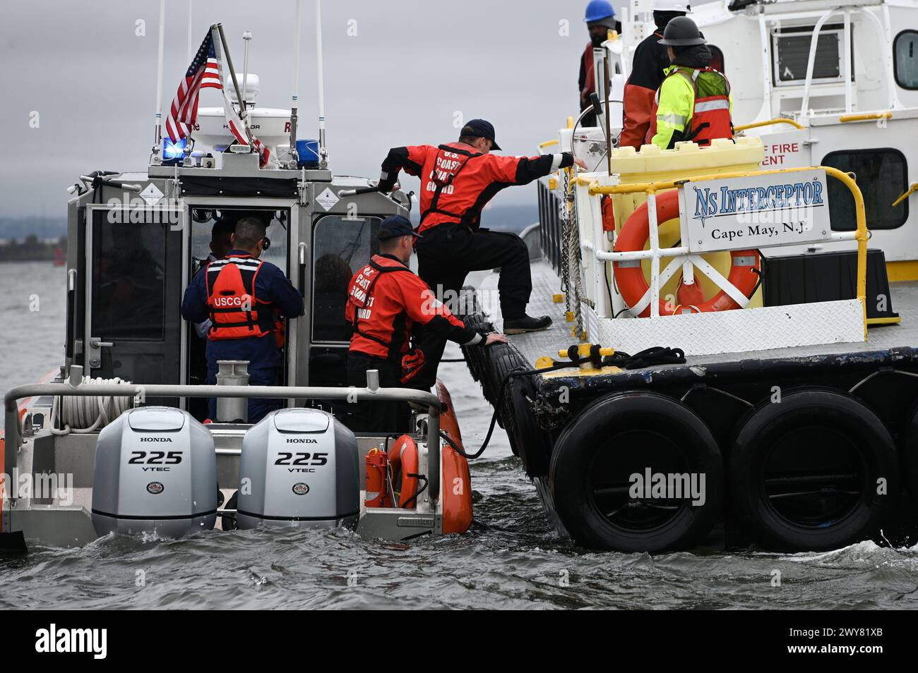 A Coast Guard response boat crew, from the Fifth Coast Guard District ...