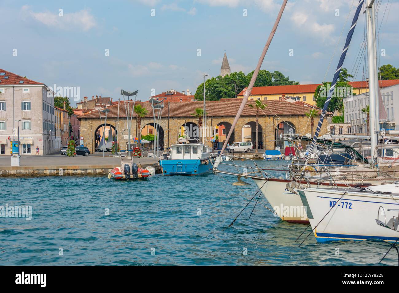 Boats mooring in the historical part of port of Koper in Slovenia Stock ...