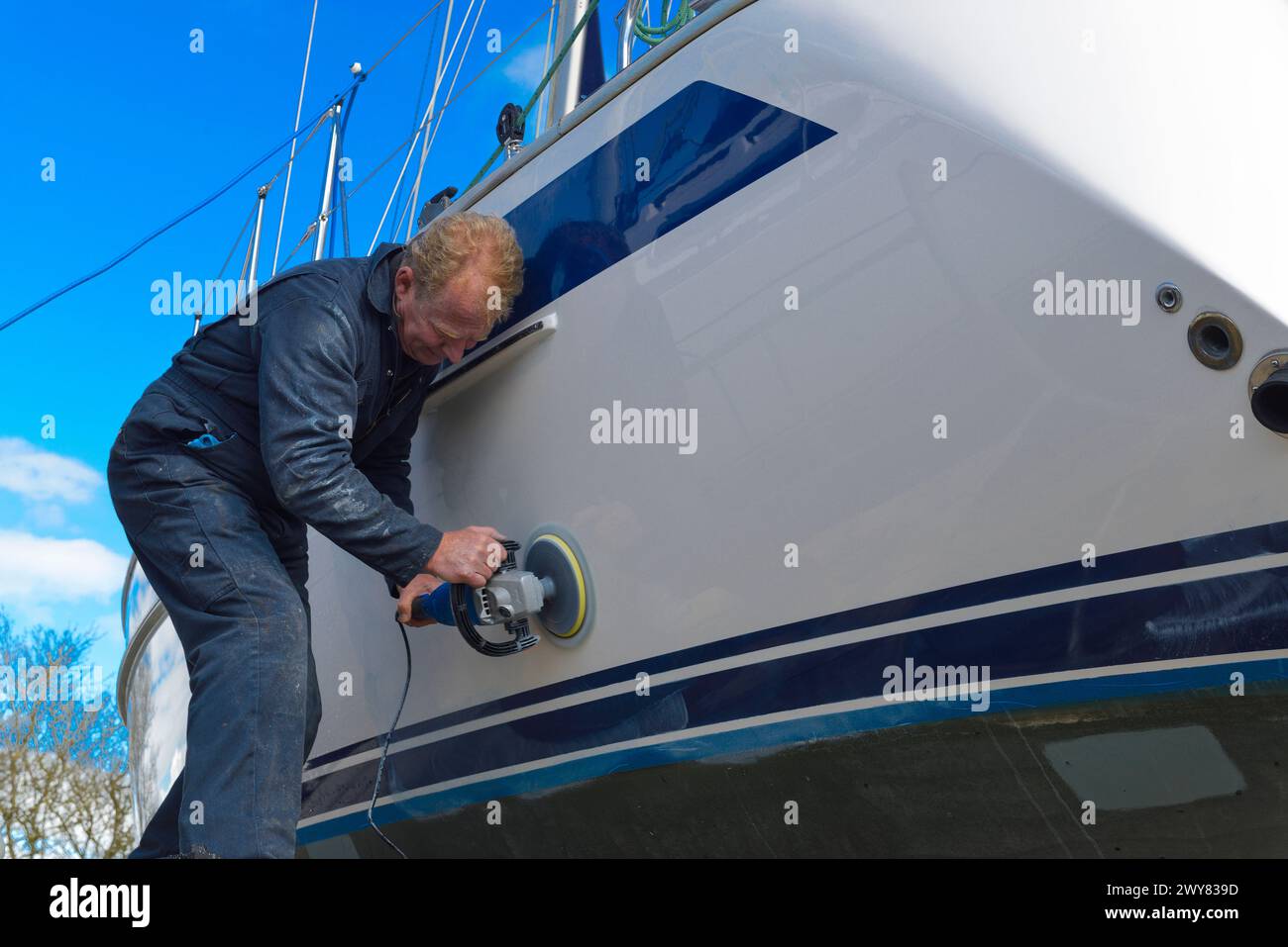 Man polishing hull hi-res stock photography and images - Alamy