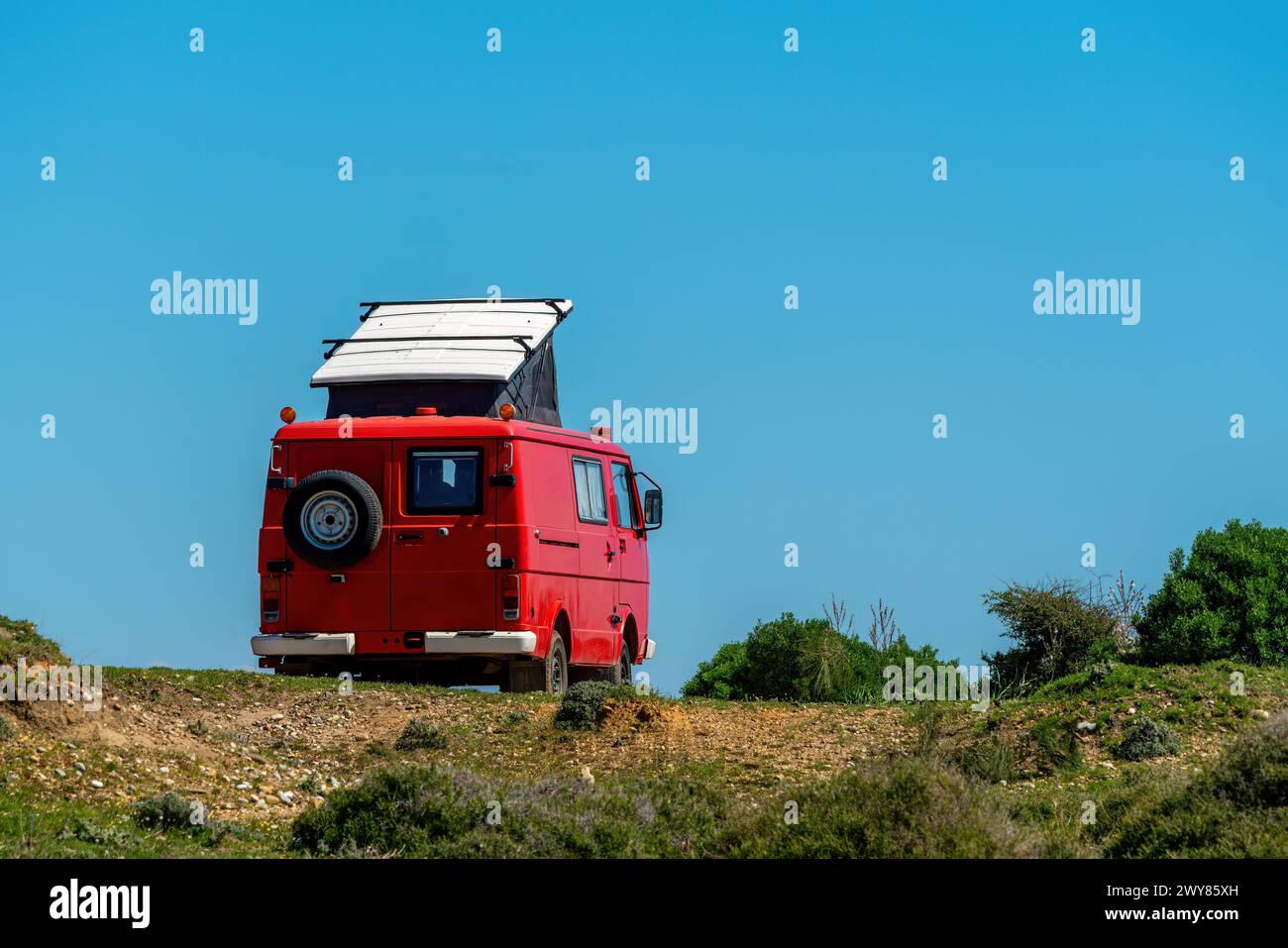 A caravan used for camping in nature. Red caravan in Turkey Stock Photo ...