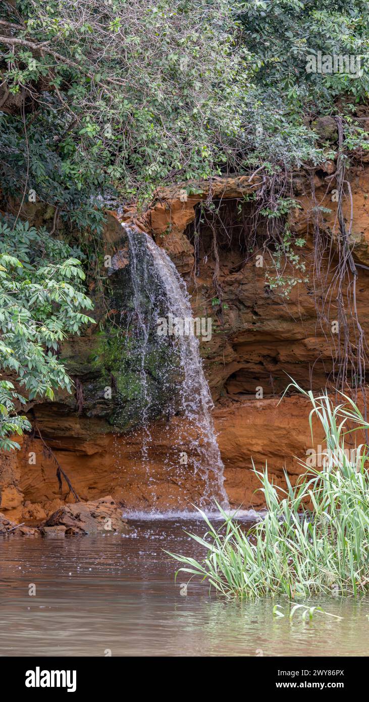 Cascading waterfall over rocky cliff hi-res stock photography and ...