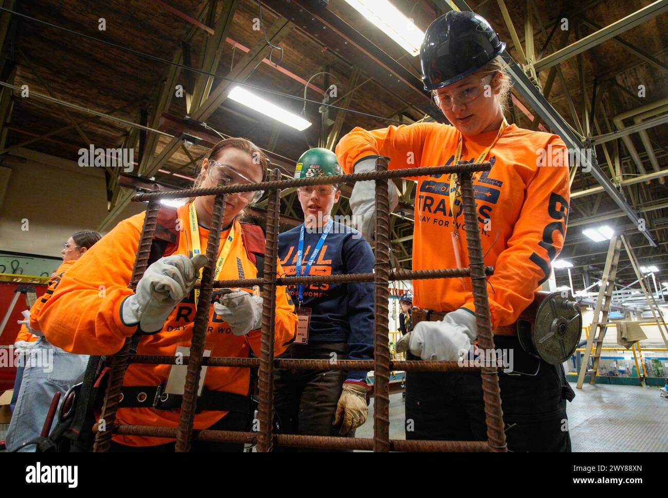 Vancouver, Canada. 4th Apr, 2024. Female students secure iron bars with ...