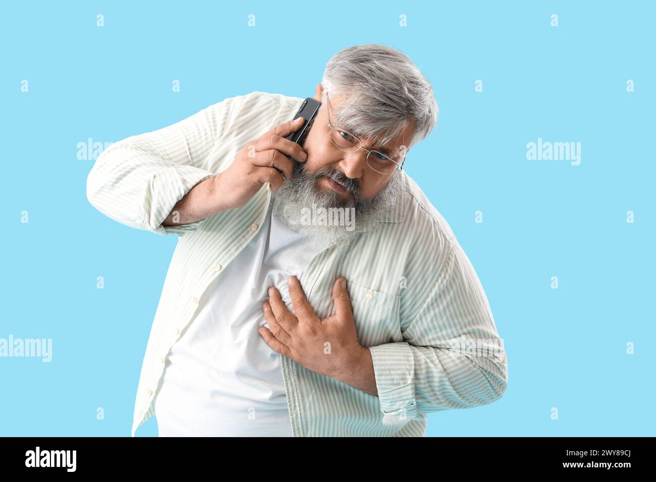Aged man calling ambulance hi-res stock photography and images - Alamy