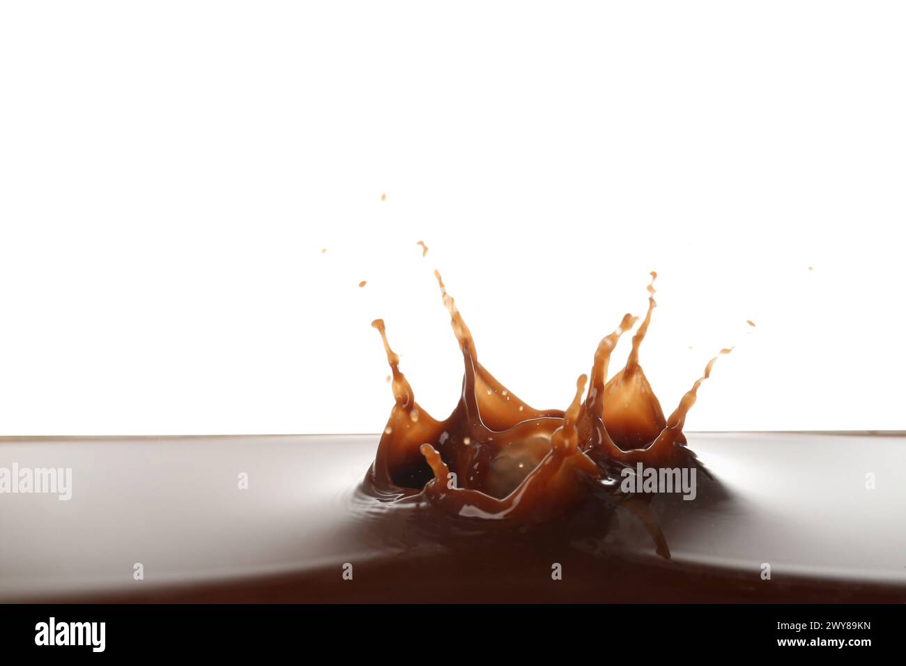 Splash of hot chocolate on white background Stock Photo - Alamy