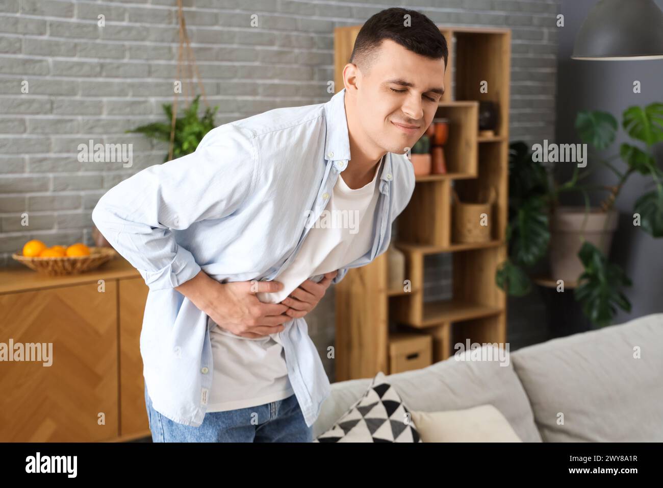 Bellyache man hi-res stock photography and images - Alamy