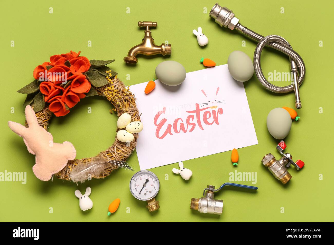 Composition with greeting card, plumber's items and Easter decor on ...
