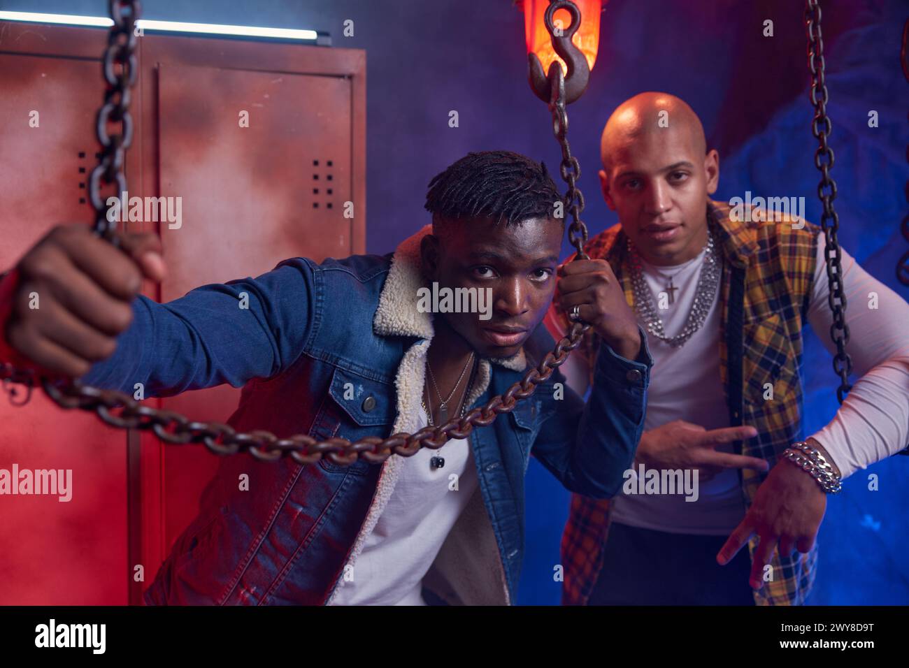 Group of modern cool hip-hop dancers at garage studio Stock Photo - Alamy