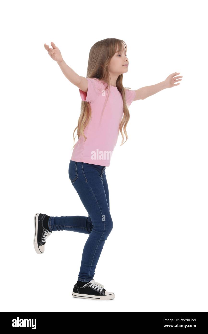 Full length portrait of cute girl running on white background Stock ...