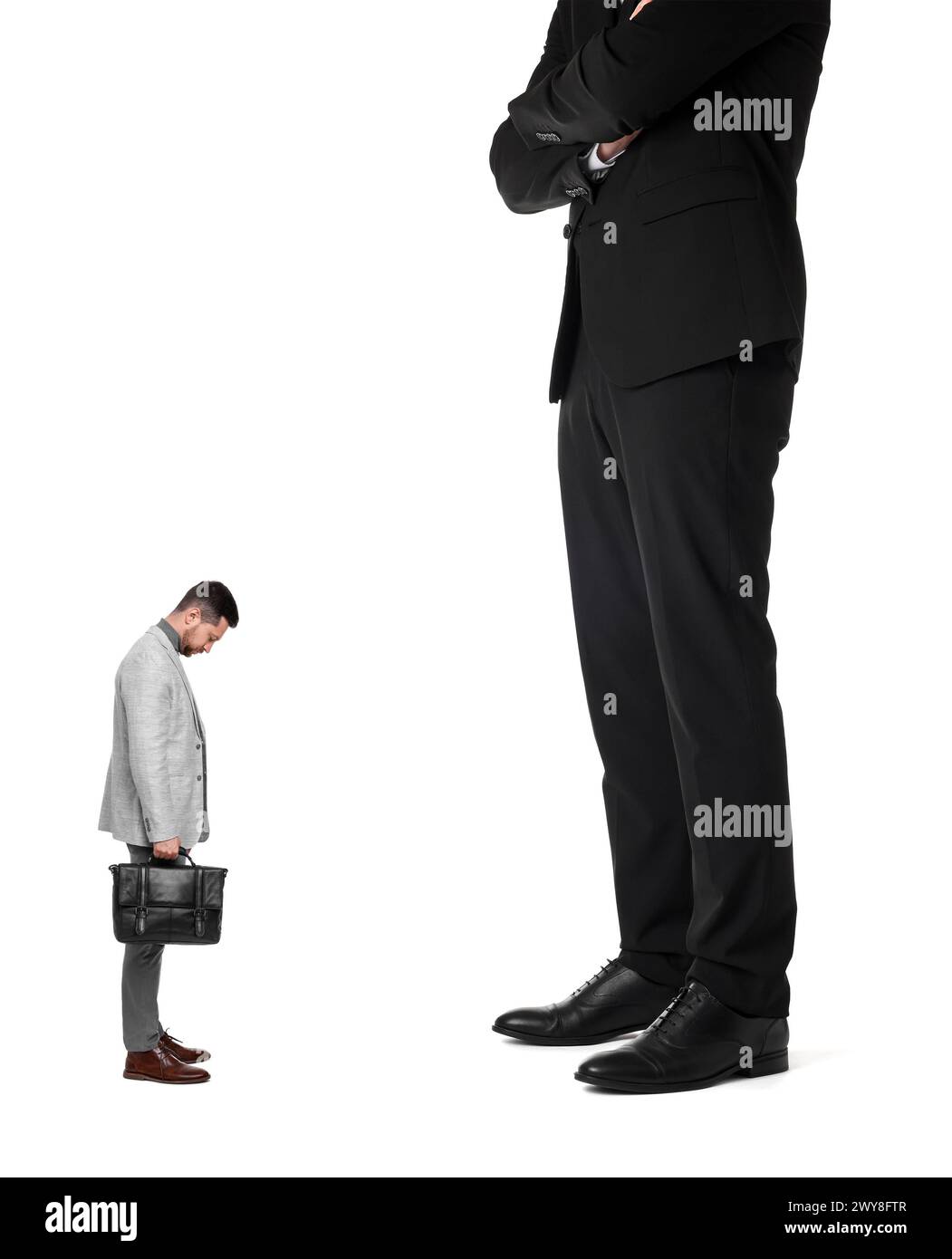 Giant boss and sad small man on white background Stock Photo - Alamy