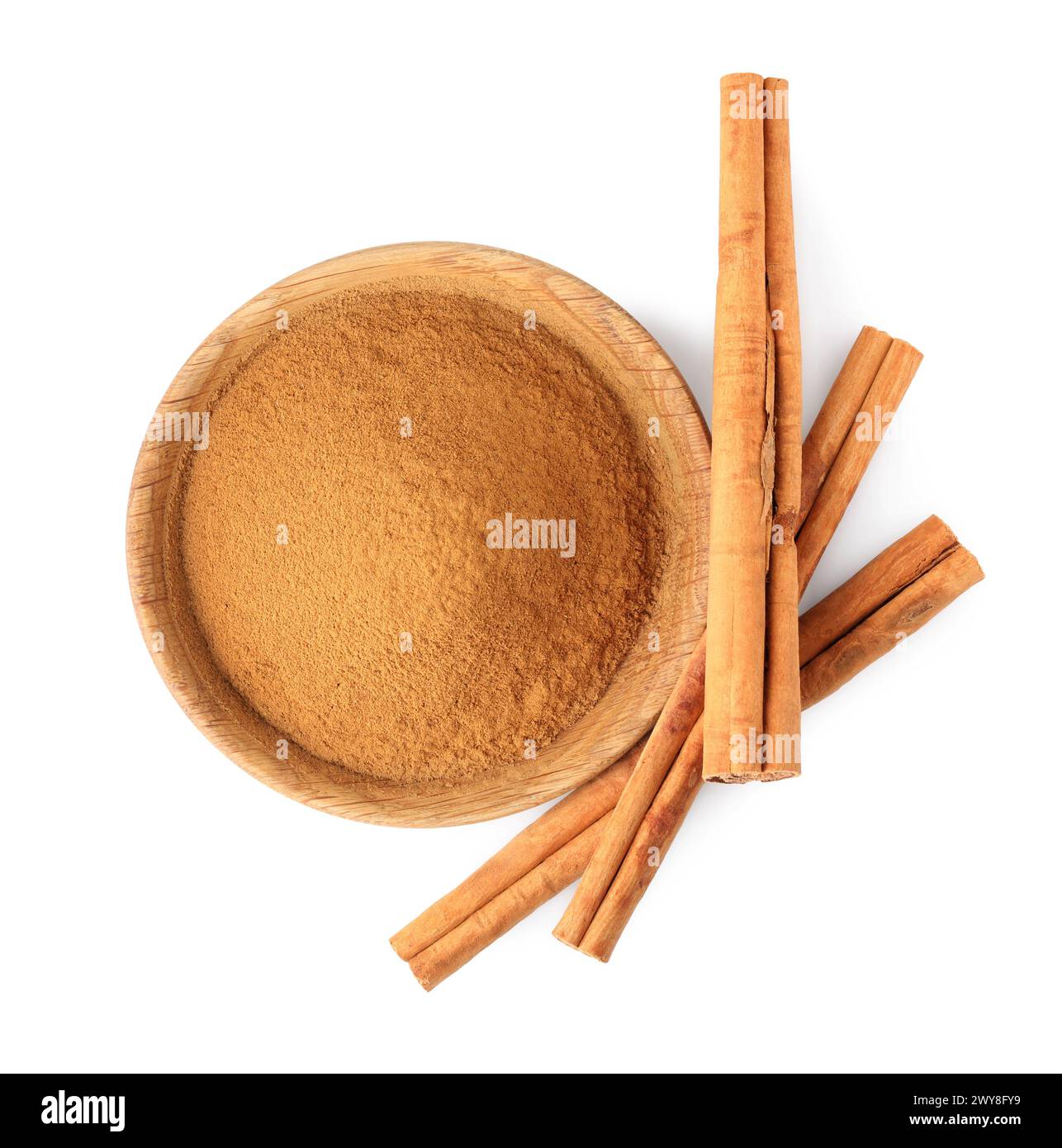 Dry aromatic cinnamon sticks and powder isolated on white, top view ...