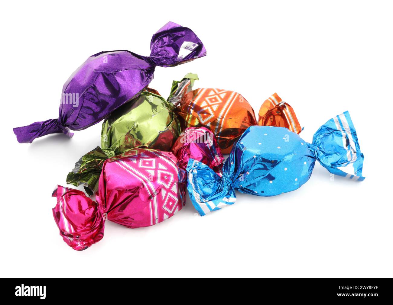 Sweet candies in colorful wrappers on white background Stock Photo - Alamy