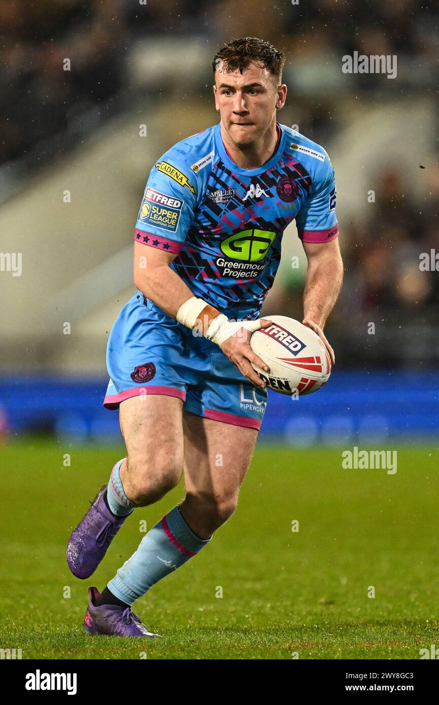 Harry Smith of Wigan Warriors makes a break during the Betfred Super ...