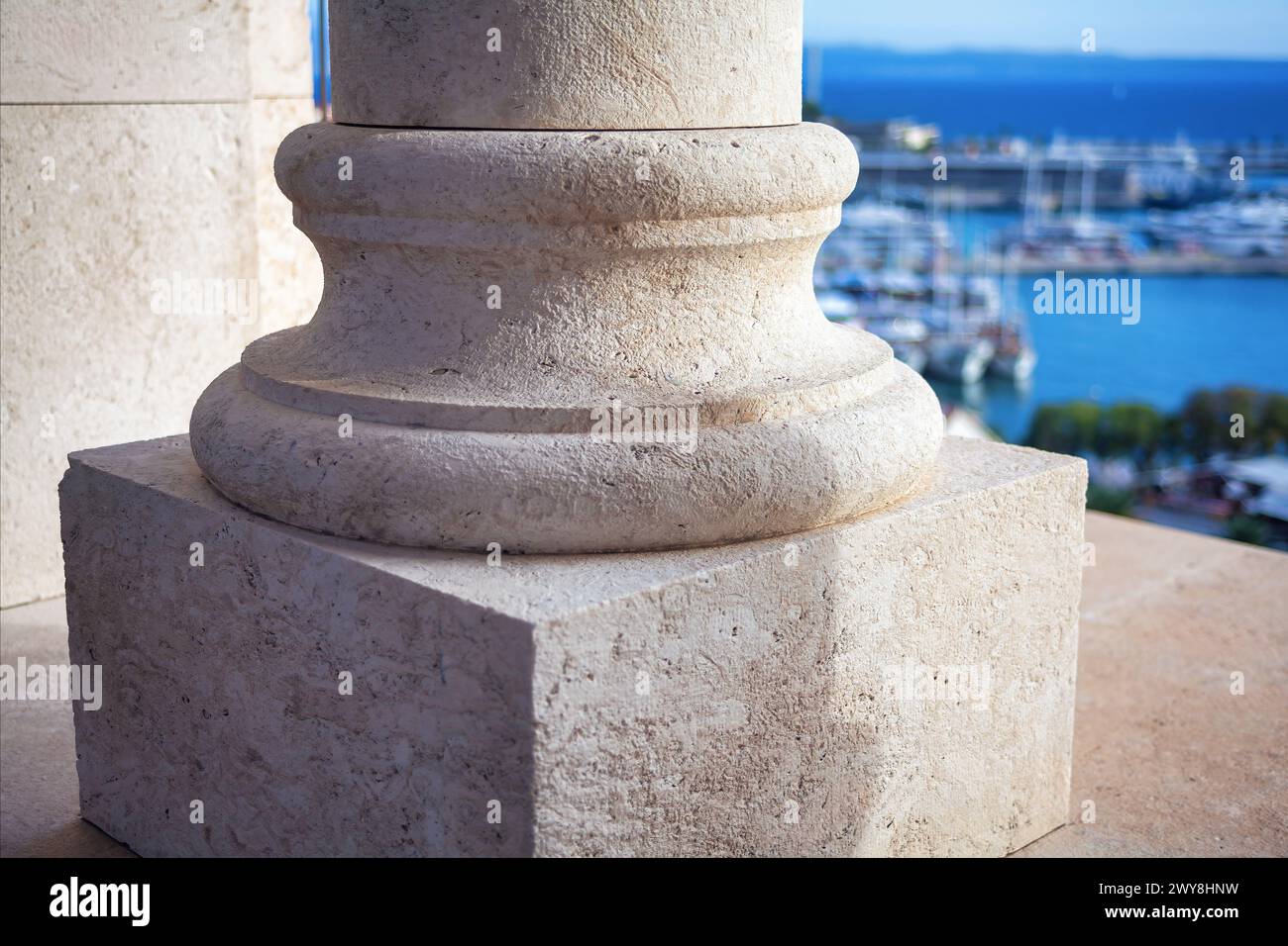 Detail of a stone column in the port. Stone column carving adds ...