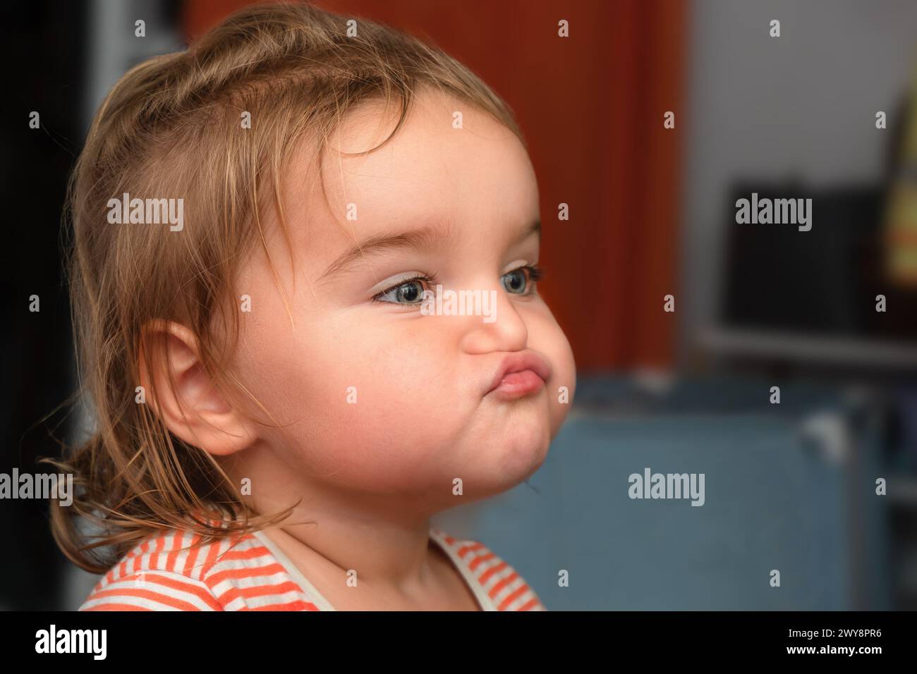 Portrait of a cute child with a grimace on his face with a pout Stock ...