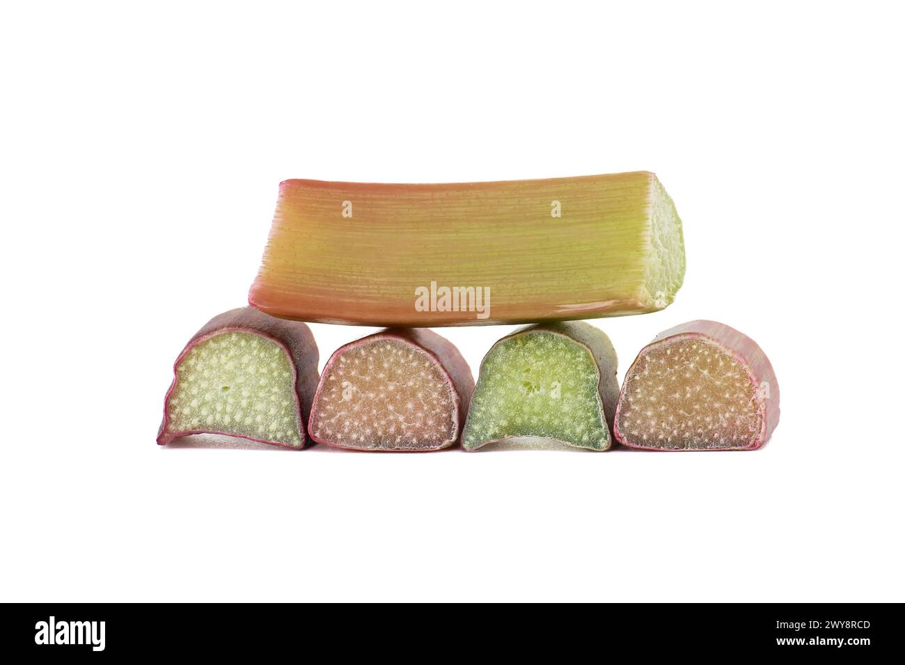 Group of rhubarb pieces in various shapes and sizes arranged in a ...