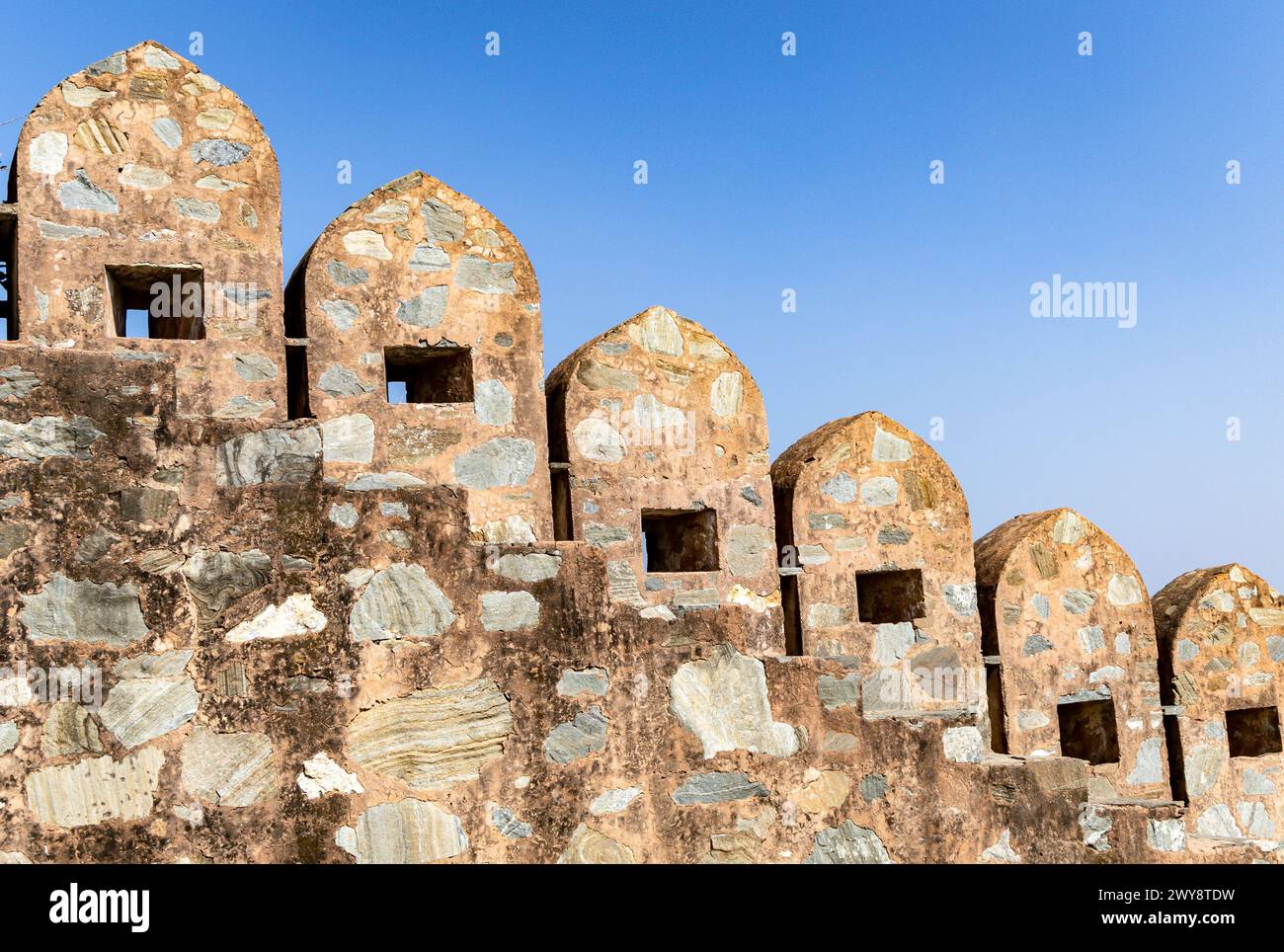 isolated ancient fort stone wall unique architecture with bright blue ...