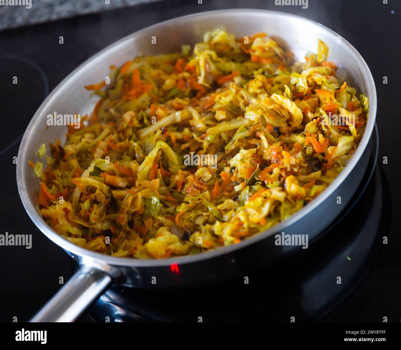Homemade braised white cabbage with vegetables Stock Photo - Alamy